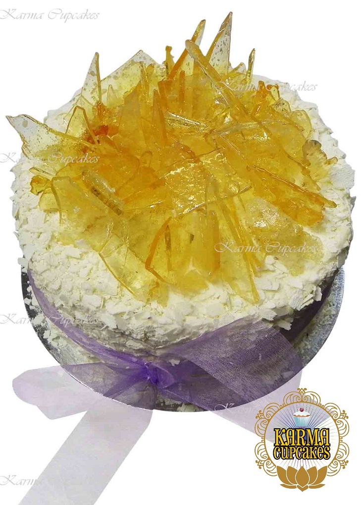 Buttercream Iced White Chocolate Gateaux with toffee shards