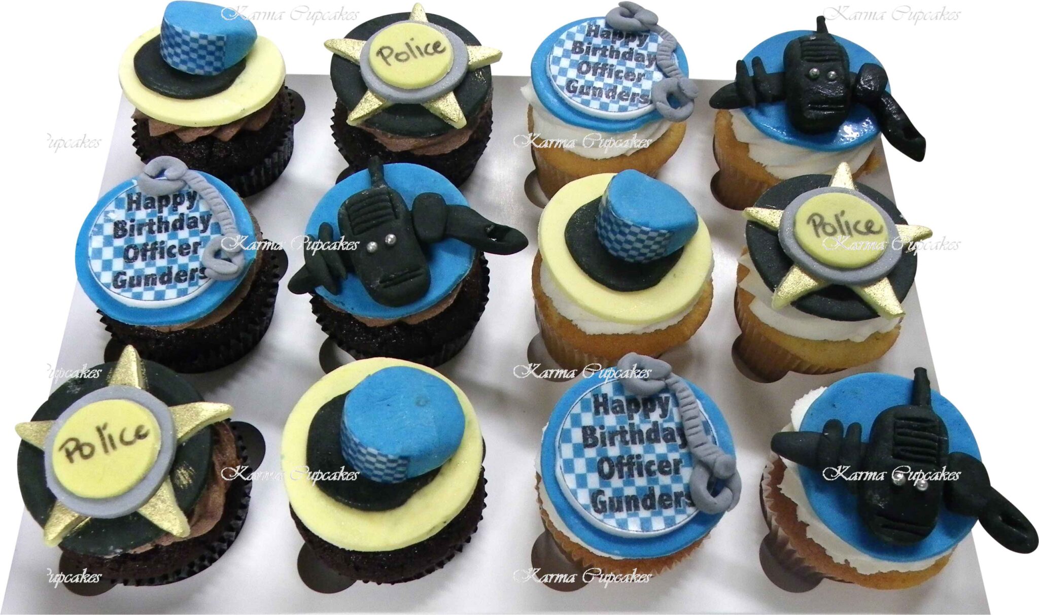 Police themed cupcakes with handmade sugar pieces - Karma Cupcakes